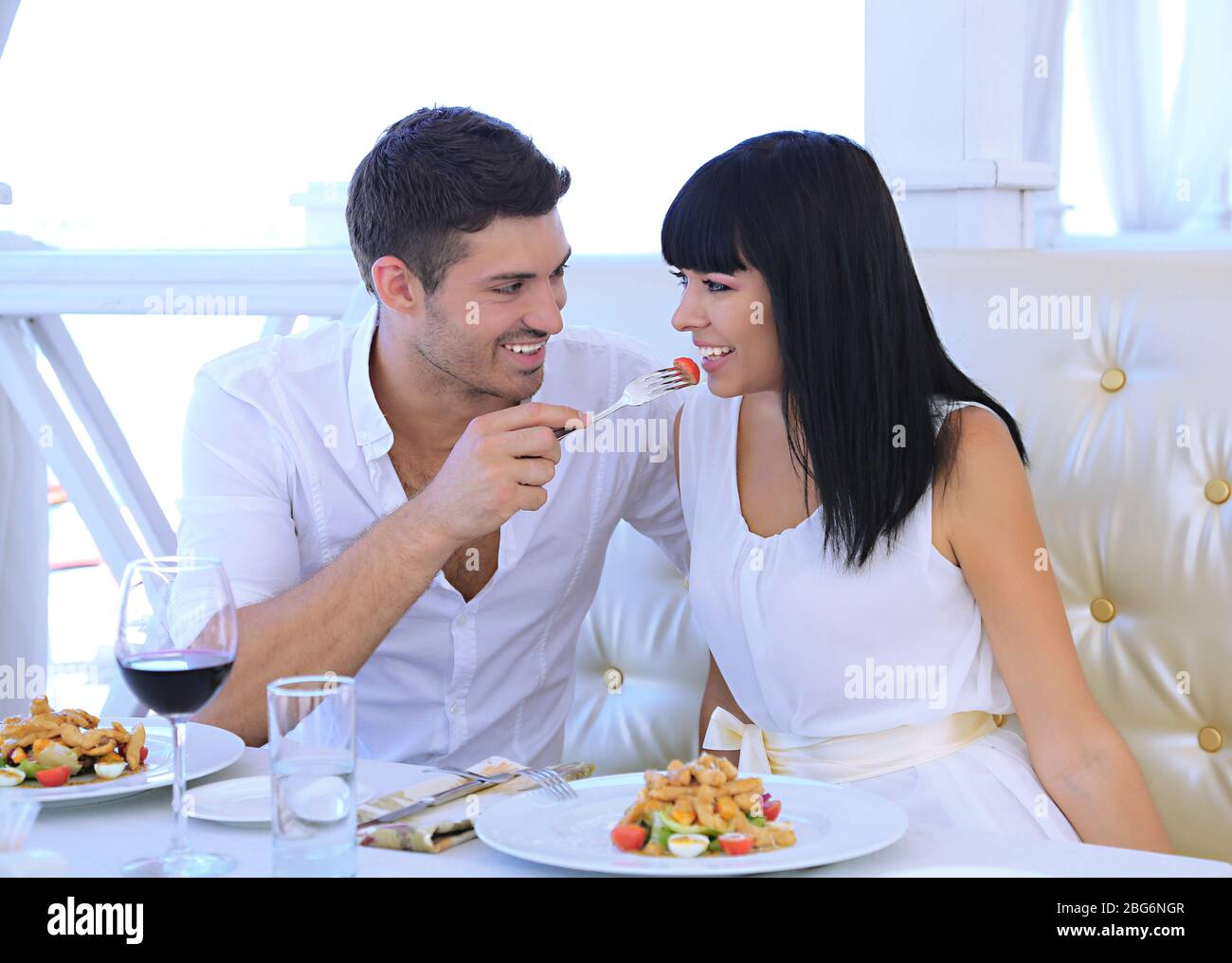 Beautiful couple having romantic dinner at restaurant Stock Photo - Alamy
