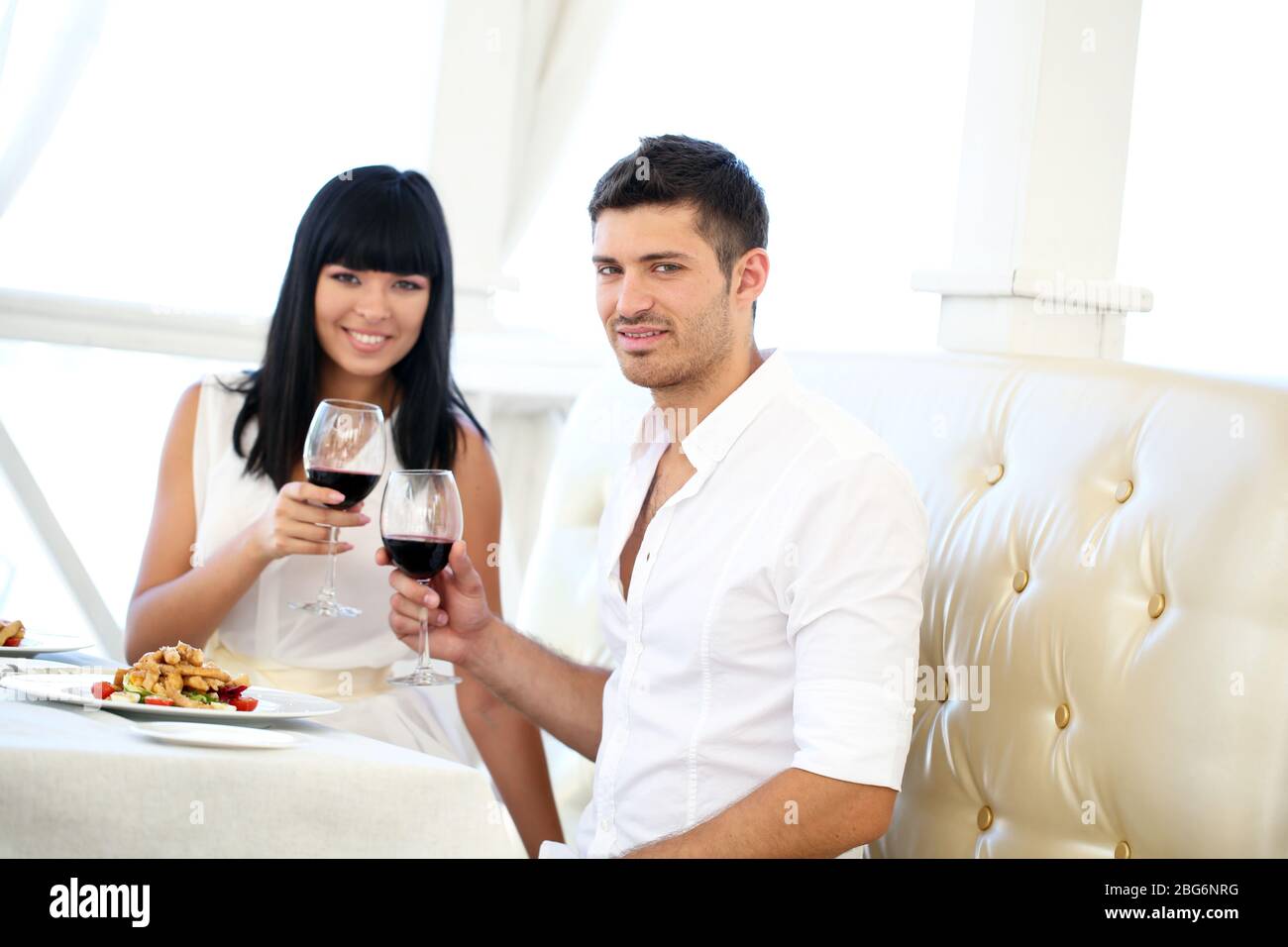 Beautiful couple having romantic dinner at restaurant Stock Photo - Alamy