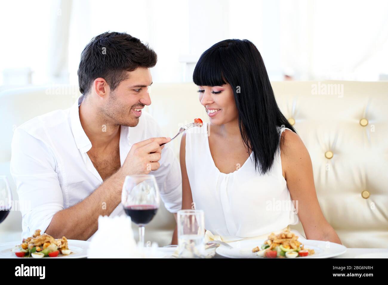 Beautiful couple having romantic dinner at restaurant Stock Photo - Alamy