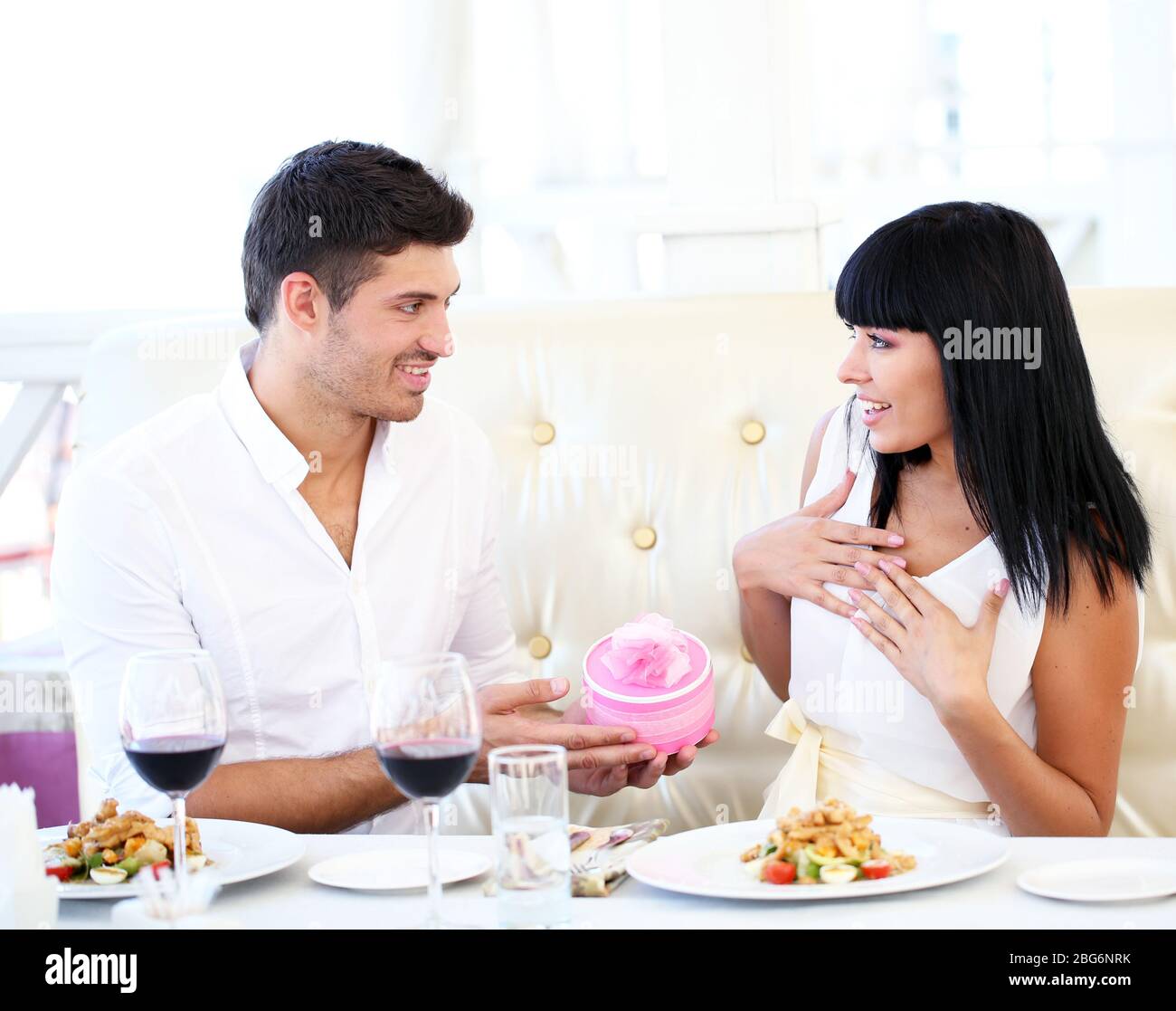 Beautiful couple having romantic dinner at restaurant Stock Photo - Alamy