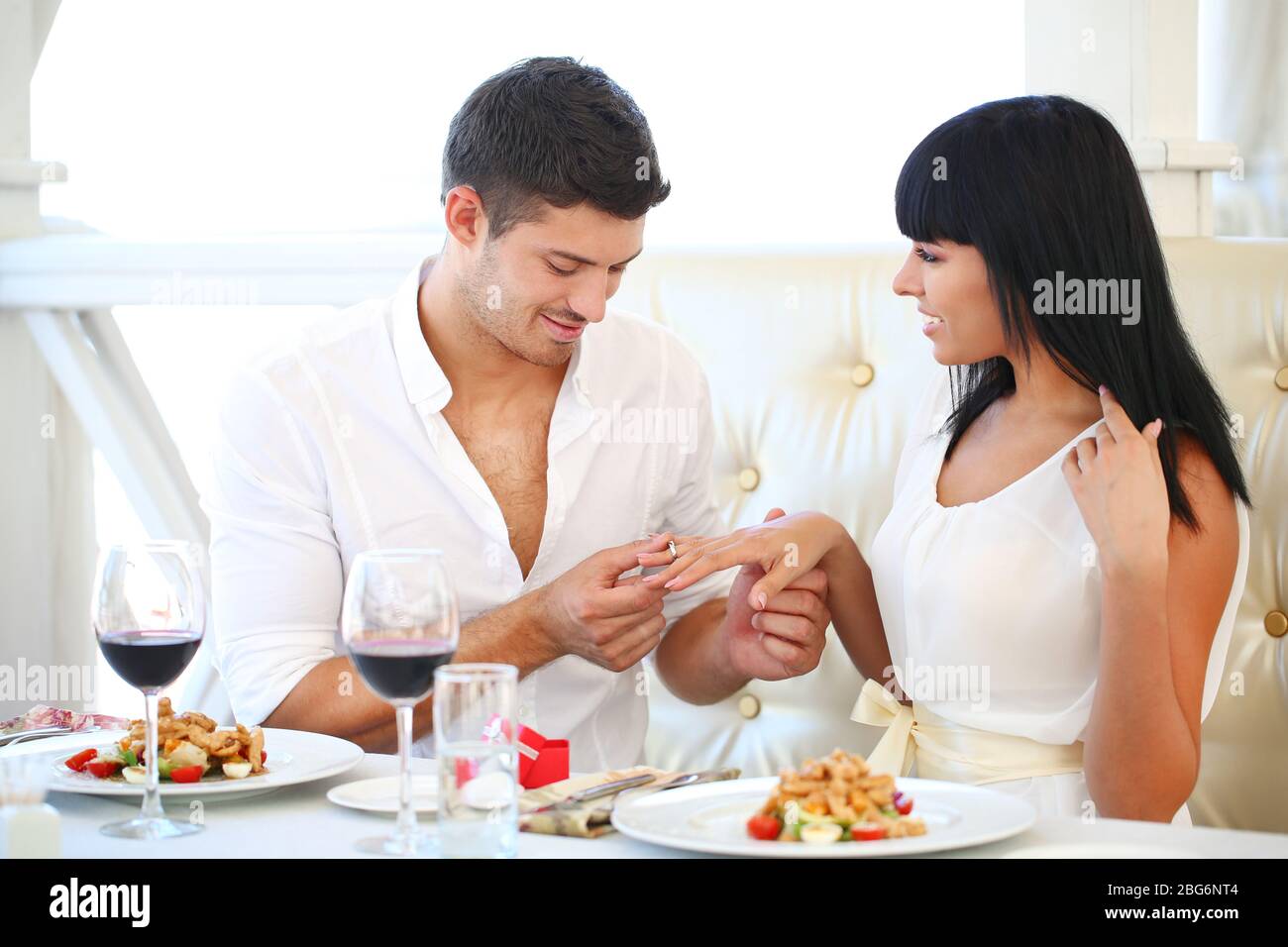 Man proposing engagement ring his woman over restaurant table Stock ...