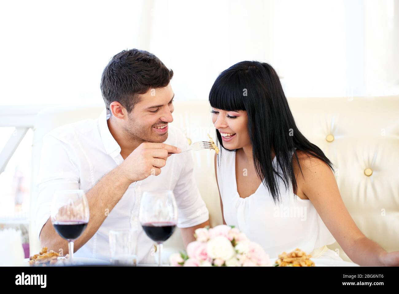 Beautiful couple having romantic dinner at restaurant Stock Photo - Alamy