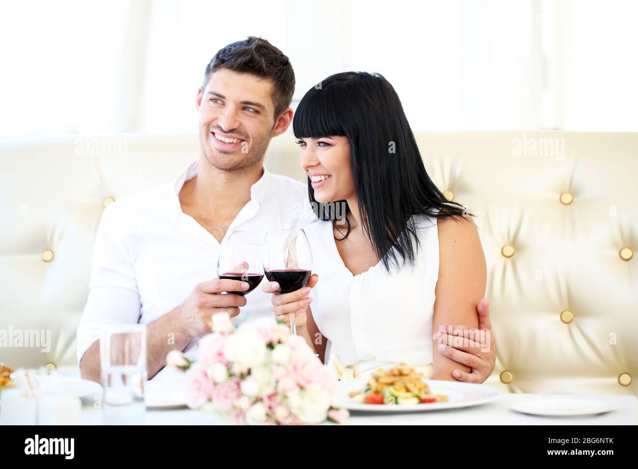 Beautiful couple having romantic dinner at restaurant Stock Photo - Alamy
