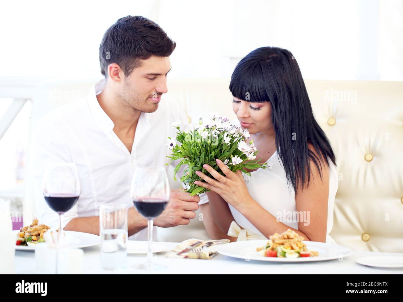 Beautiful couple having romantic dinner at restaurant Stock Photo - Alamy