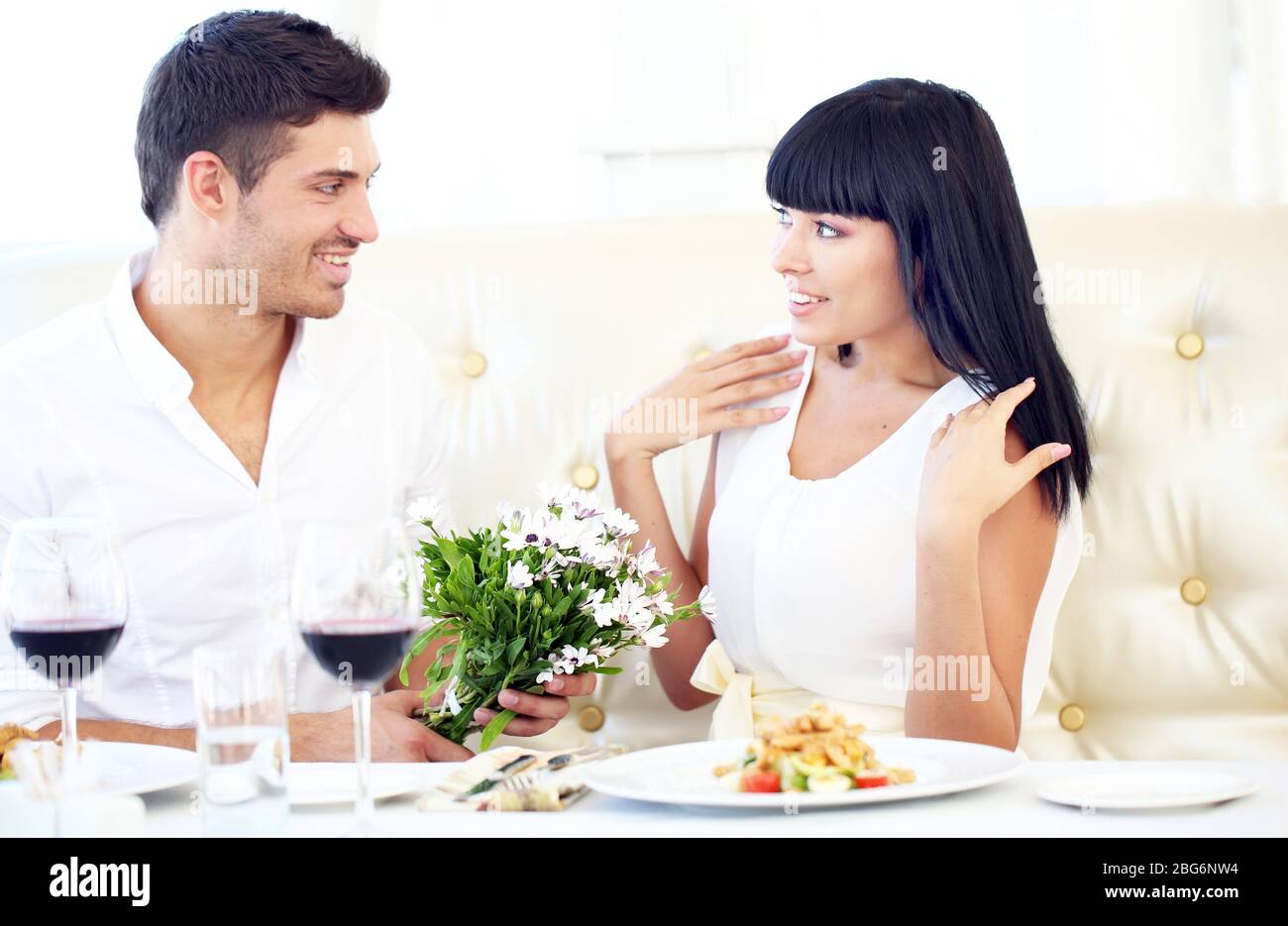 Beautiful couple having romantic dinner at restaurant Stock Photo - Alamy