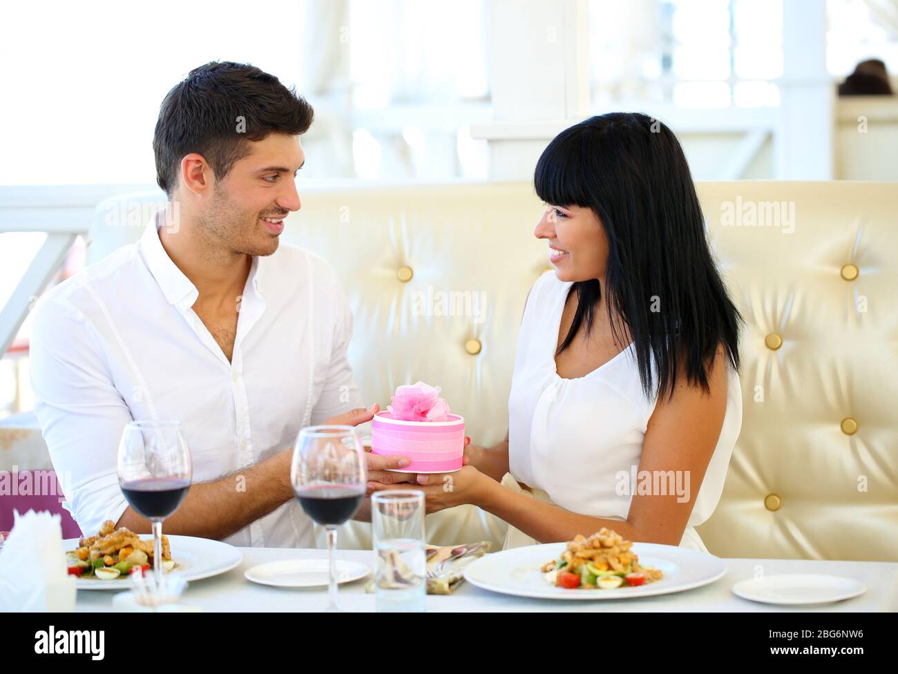 Beautiful couple having romantic dinner at restaurant Stock Photo - Alamy