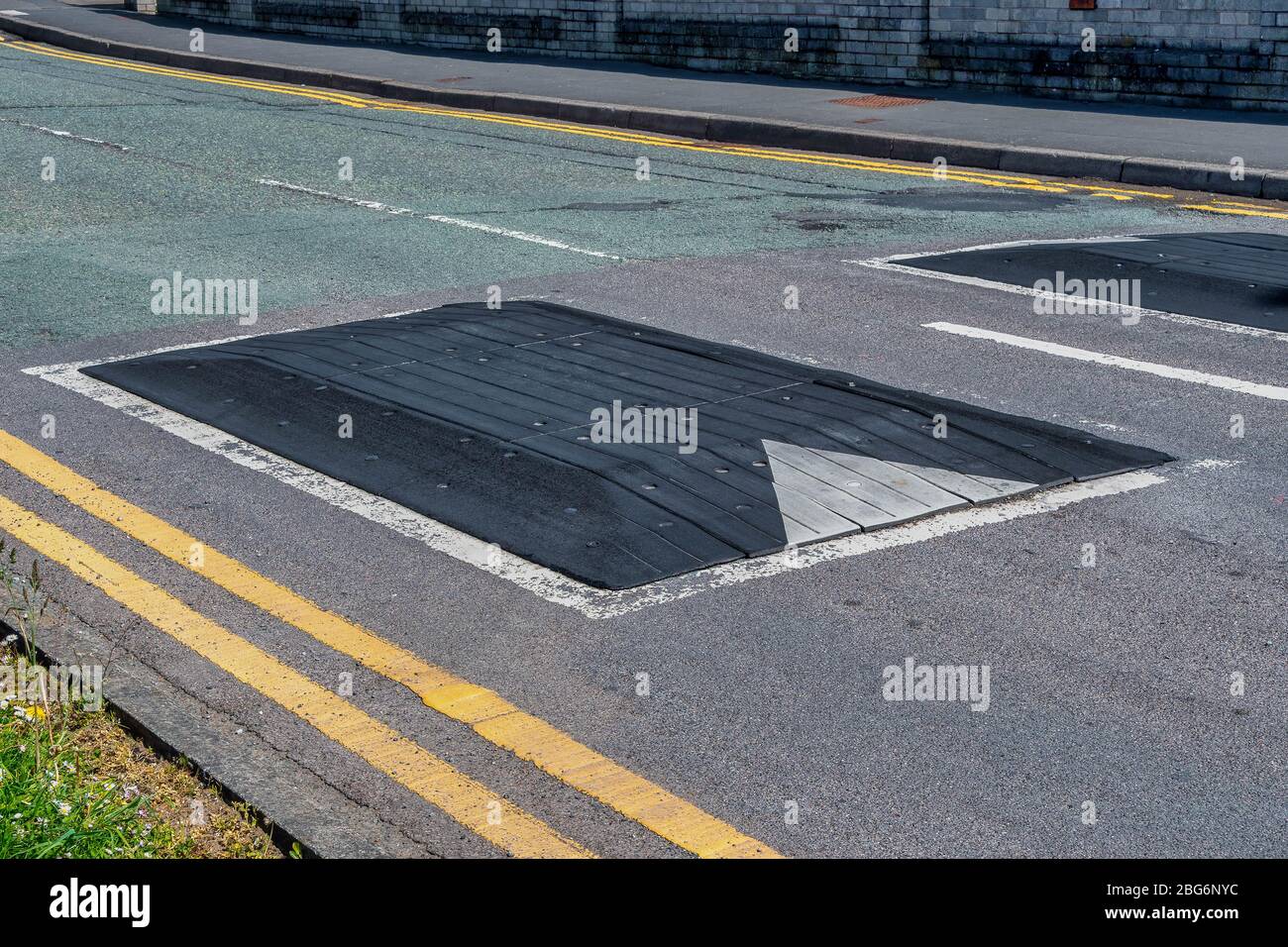 Rubber road bumps, humps in the middle of the road to reduce speed ...