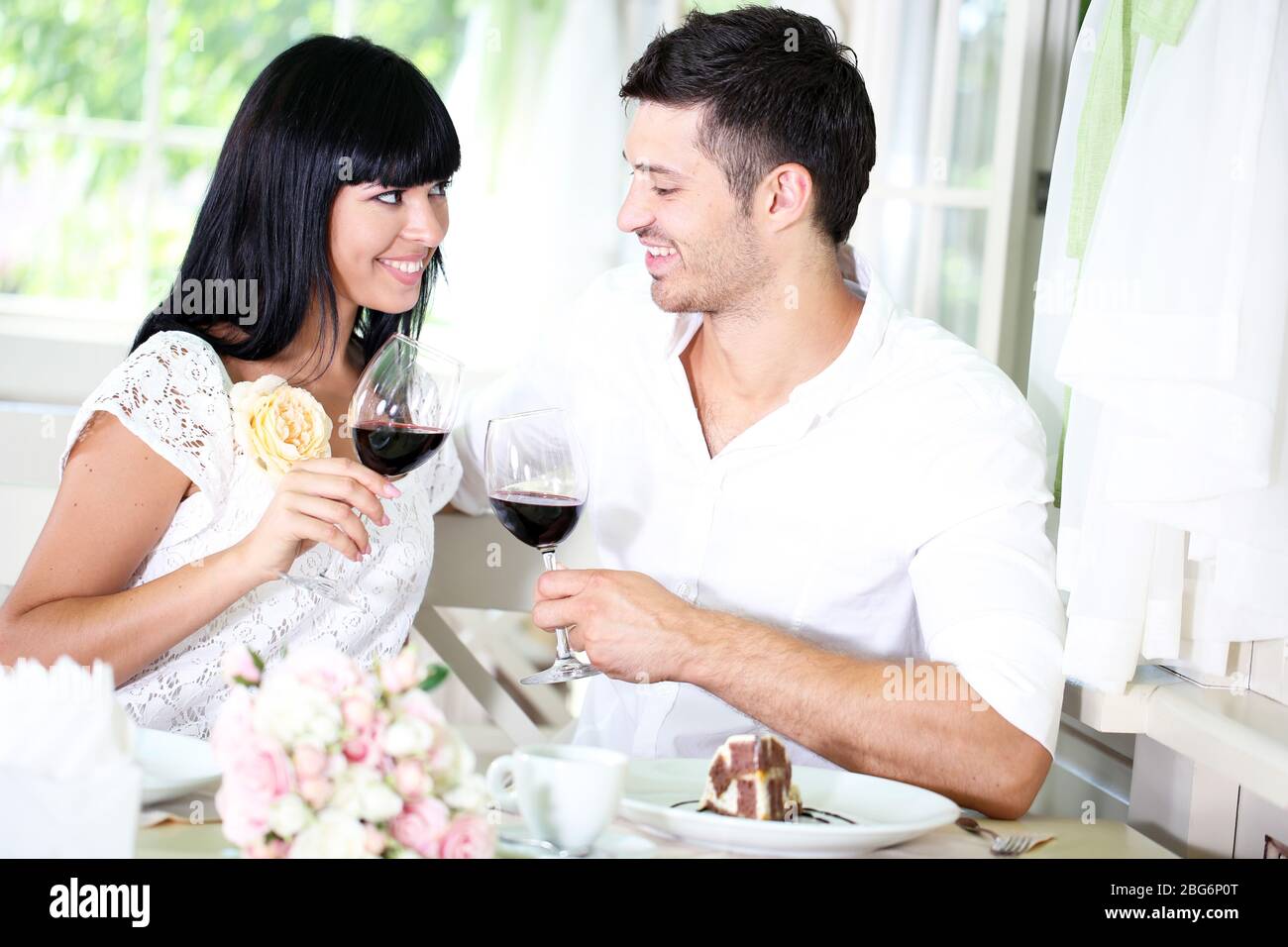 Beautiful couple having romantic dinner at restaurant Stock Photo - Alamy