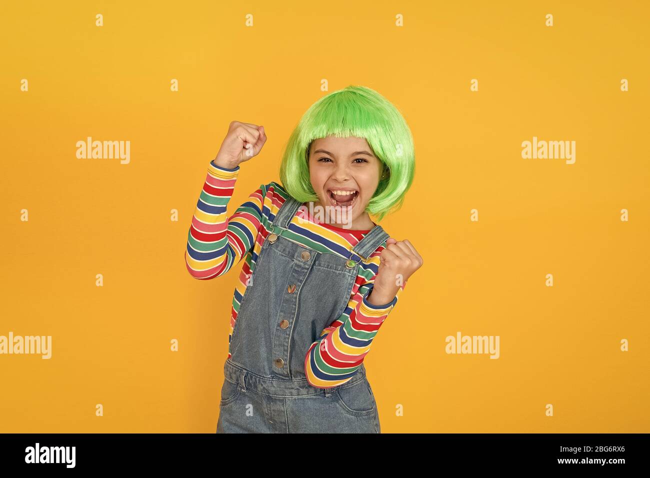 Winner reaching her goal. Excited little child make winner gesture ...