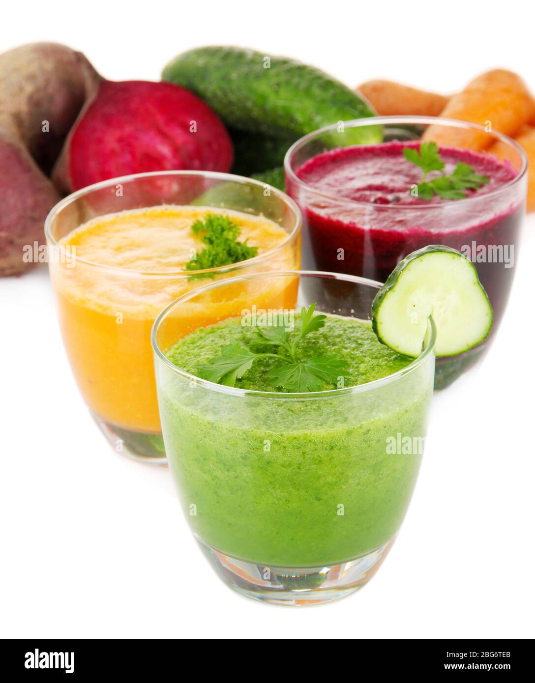 Fresh vegetable juices isolated on white Stock Photo - Alamy