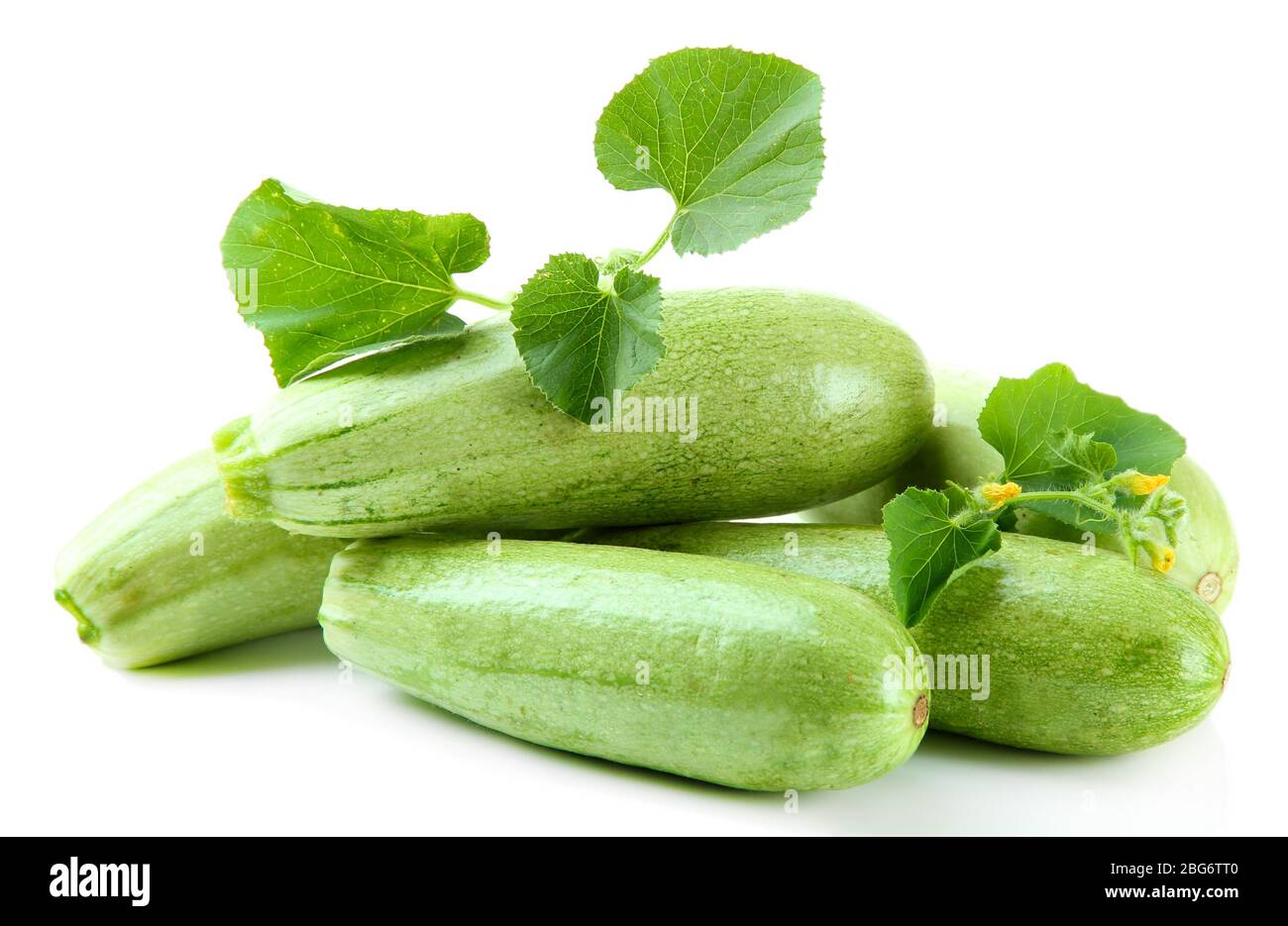 Raw zucchini with leaves, isolated on white Stock Photo - Alamy