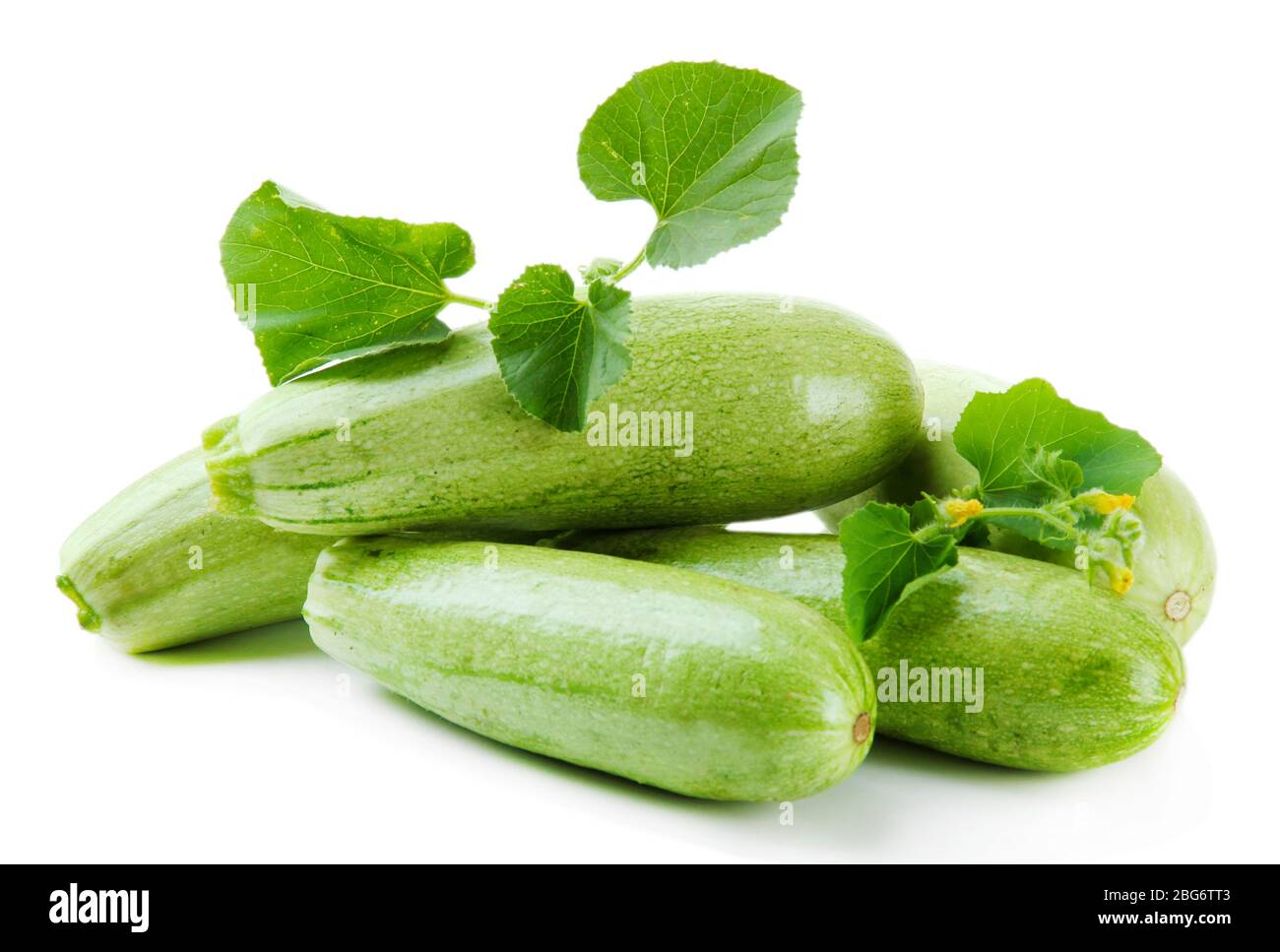 Raw zucchini with leaves, isolated on white Stock Photo - Alamy
