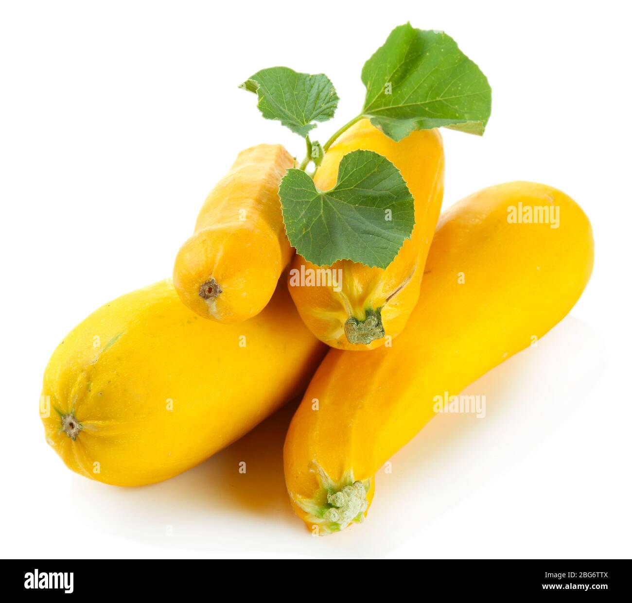 Raw yellow zucchini with leaves, isolated on white Stock Photo - Alamy