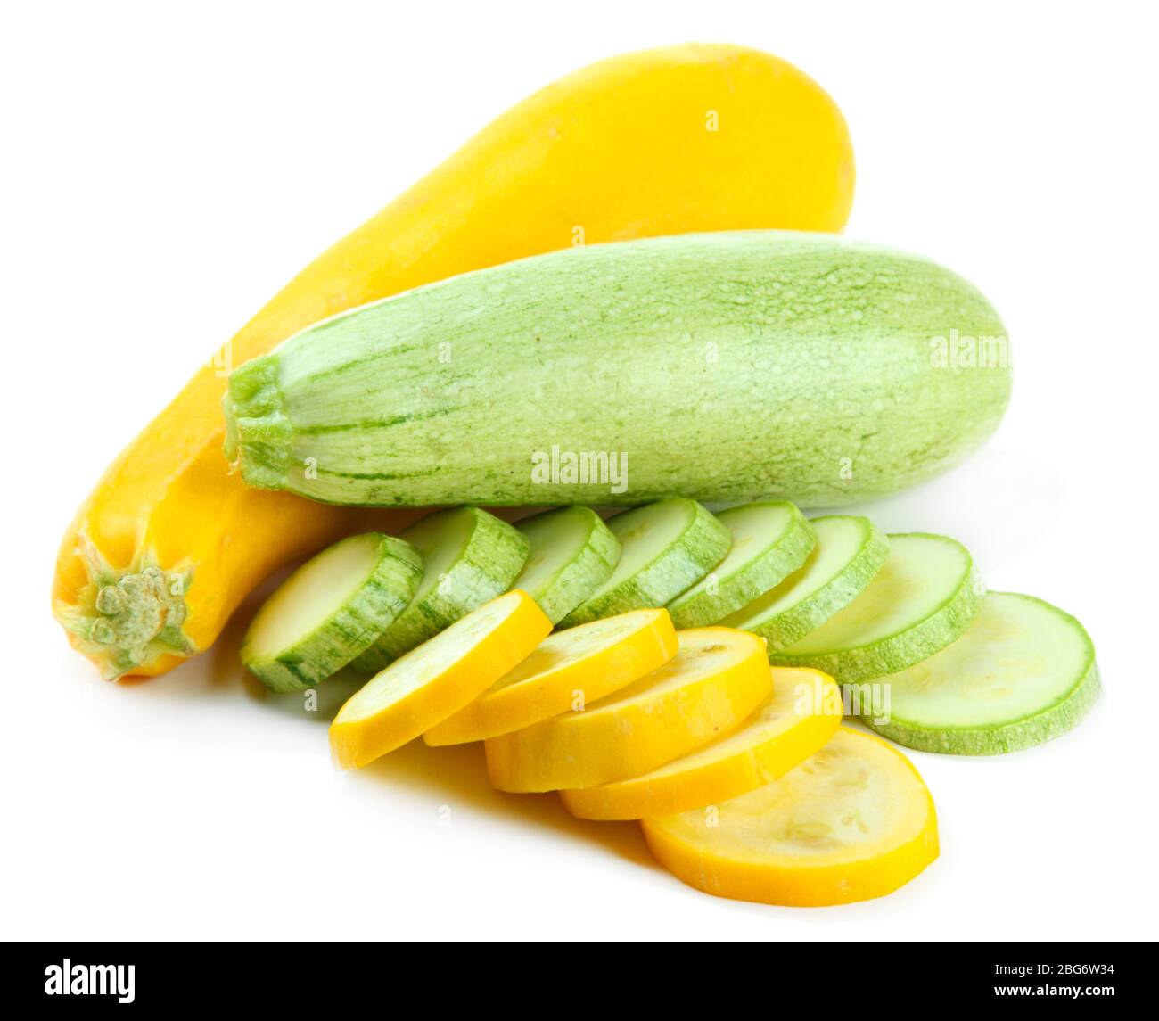 Sliced and whole raw zucchini, isolated on white Stock Photo - Alamy
