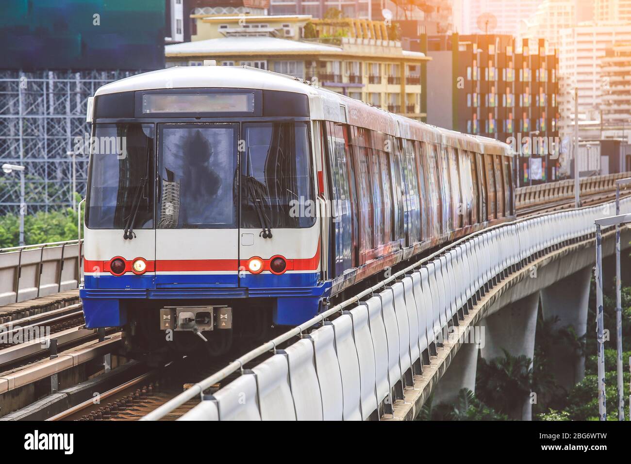 BTS Sky Train is running in downtown of Bangkok. Sky train is fastest ...