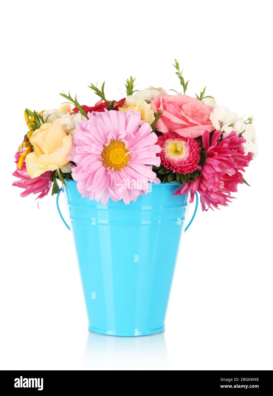 Beautiful bouquet of bright flowers in color vase, isolated on white ...