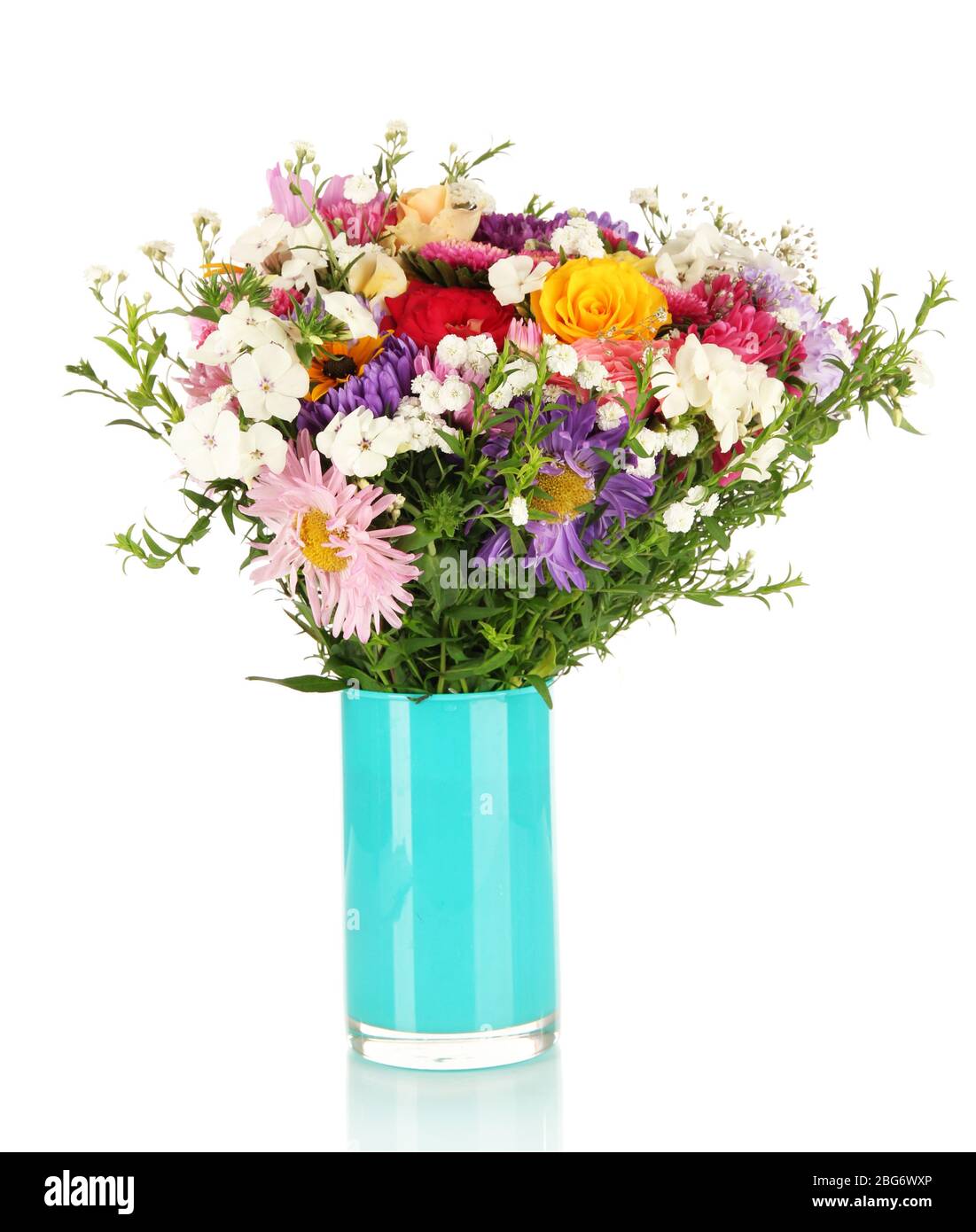 Beautiful bouquet of bright flowers in color vase, isolated on white ...