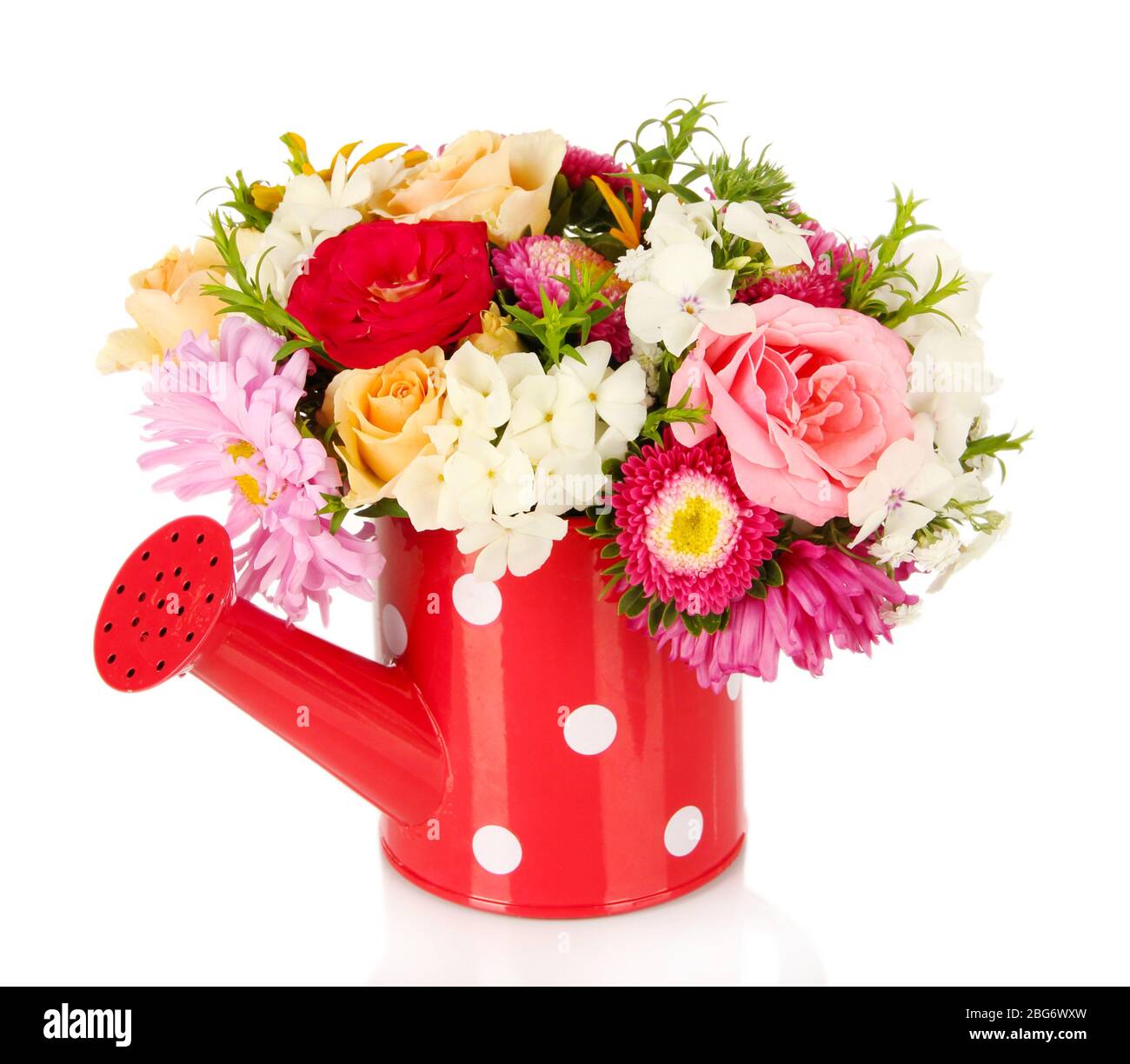 Beautiful bouquet of bright flowers in color vase, isolated on white ...