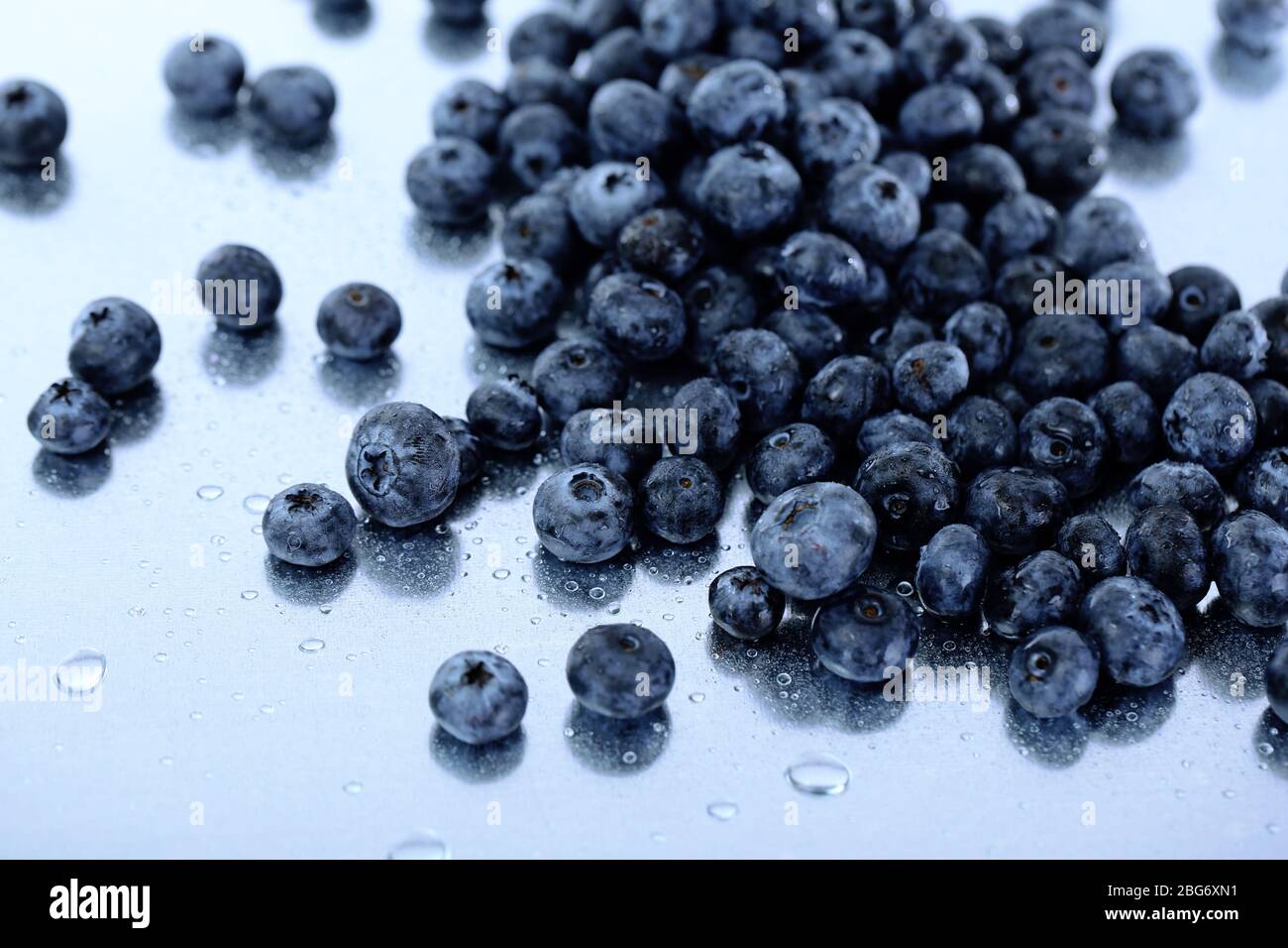 Blueberries on metal background Stock Photo - Alamy