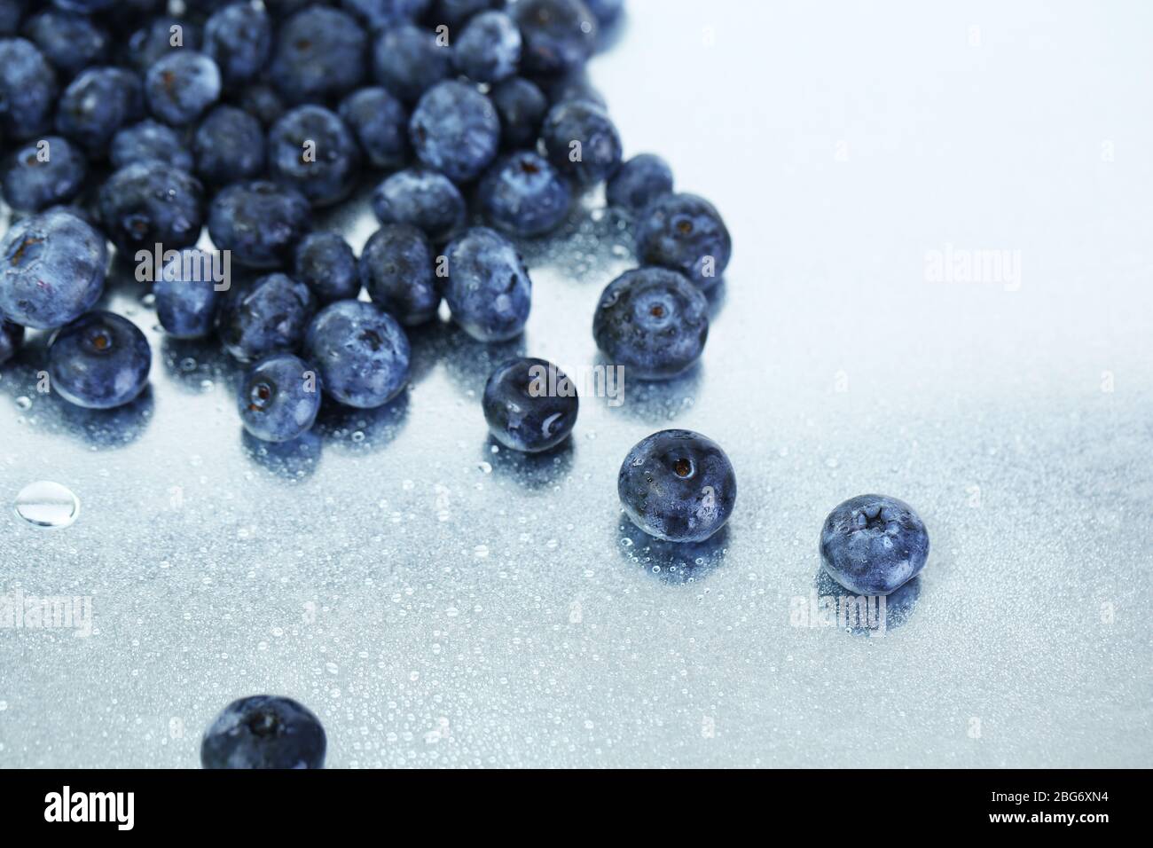 Blueberries on metal background Stock Photo - Alamy