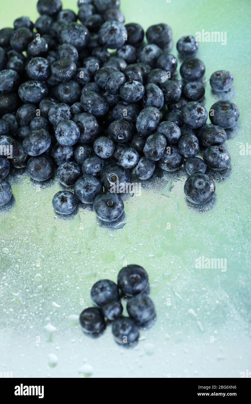 Blueberries on metal background Stock Photo - Alamy