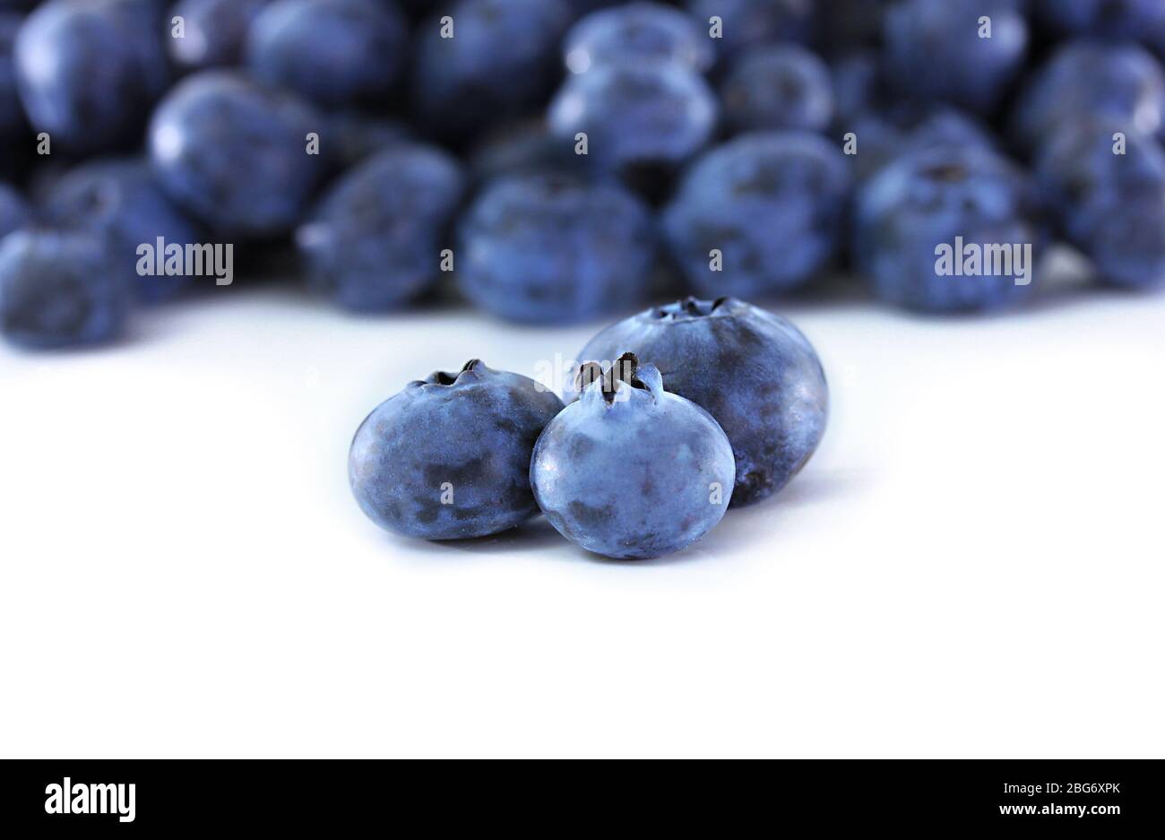 Blueberries isolated on white Stock Photo - Alamy