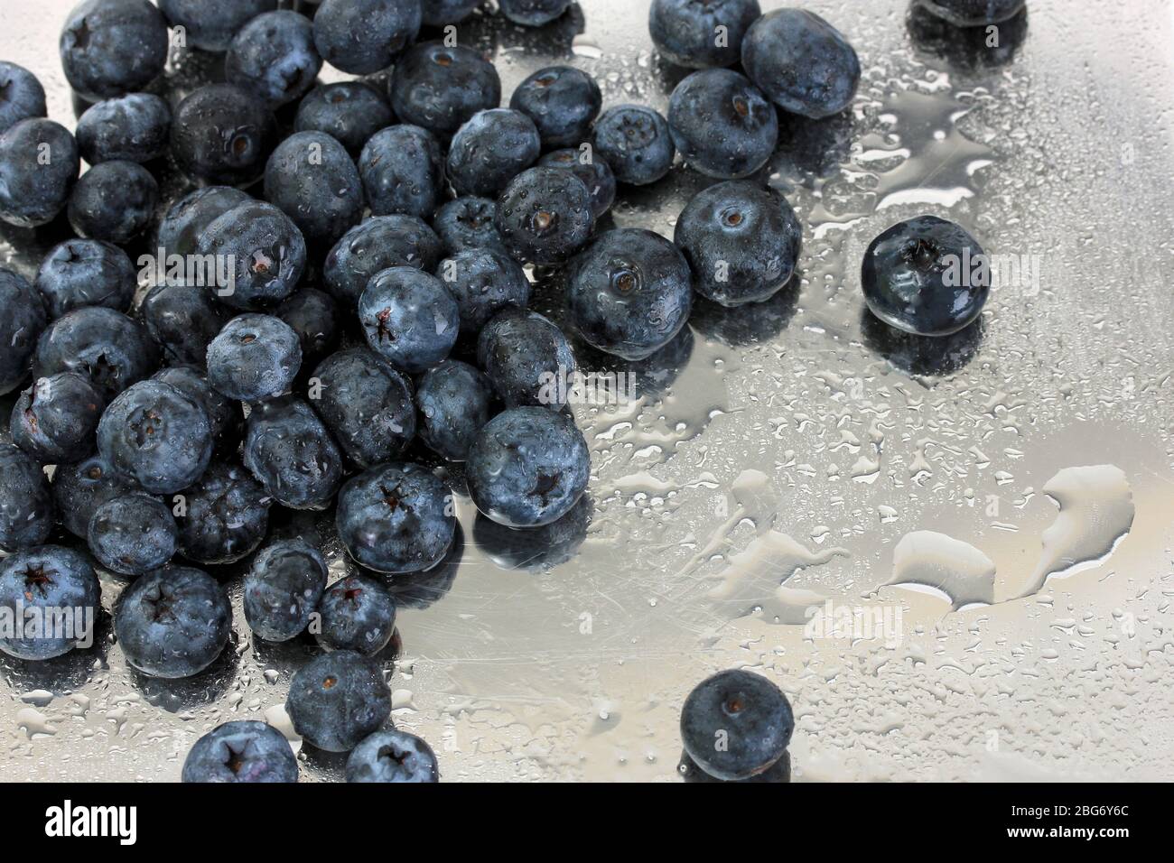 Blueberries on metal background Stock Photo - Alamy