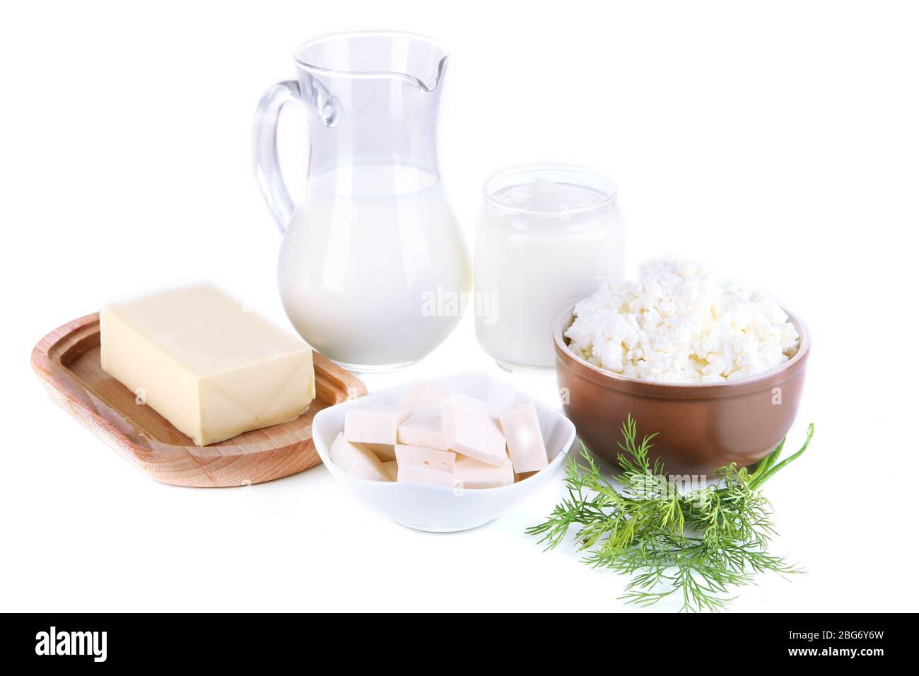 Fresh dairy products with greens isolated on white Stock Photo - Alamy