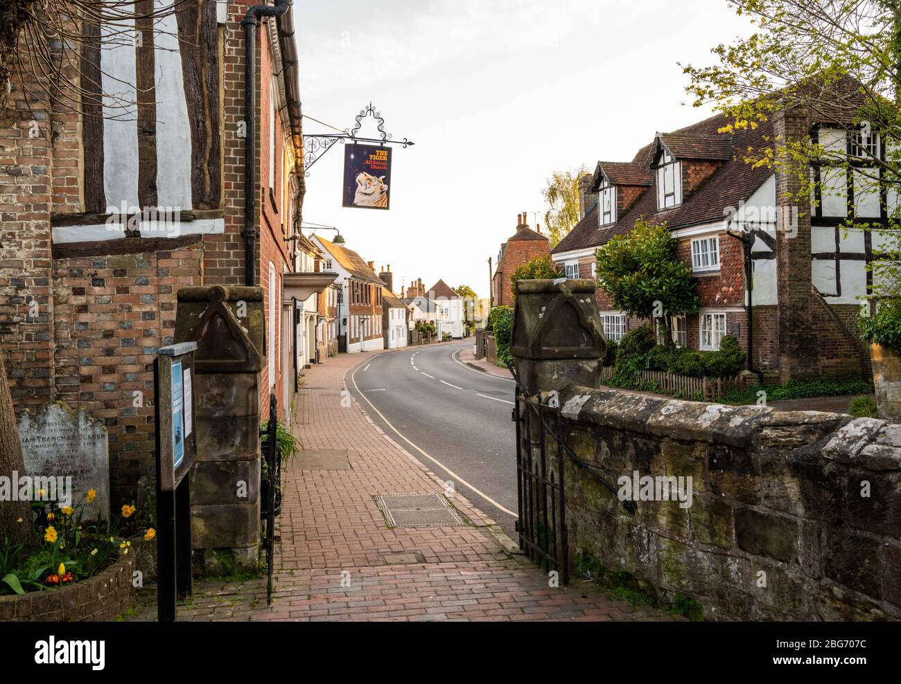 View down northern part of High Street with The Tiger All Saints Church ...