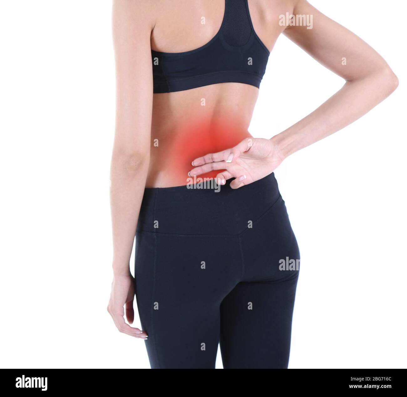 Back pain in young girl isolated on white Stock Photo - Alamy