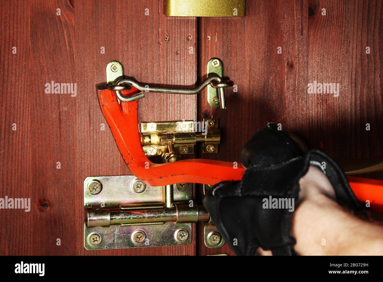 Robber breaks castle in door close-up Stock Photo - Alamy