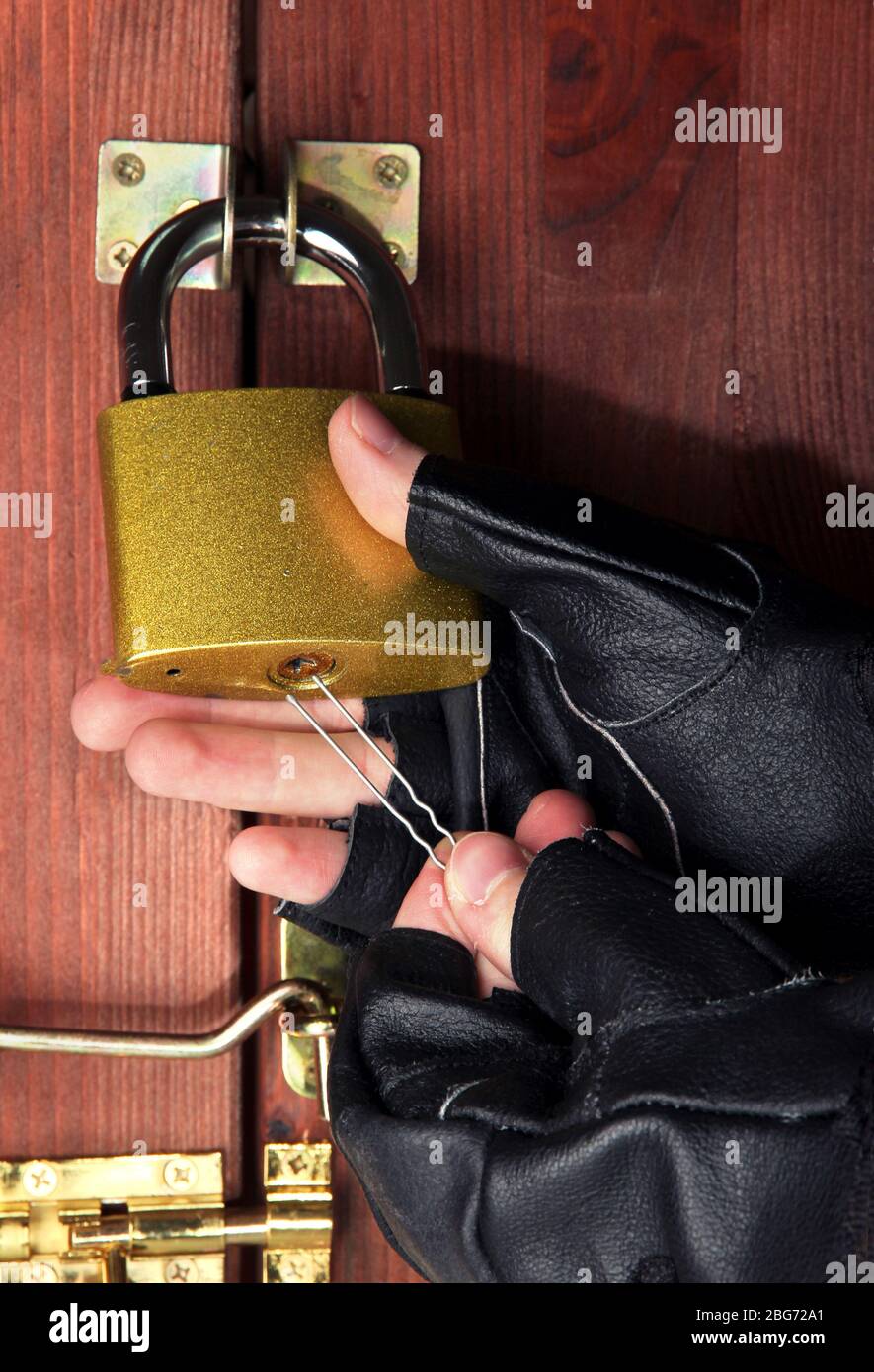 Robber breaks castle in door close-up Stock Photo - Alamy