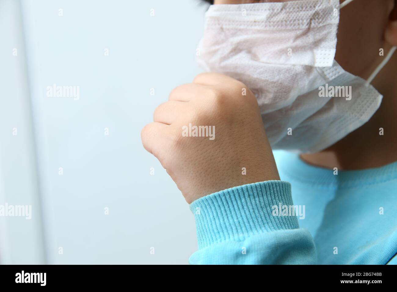 Sick Child wearing surgical mask coughing . Kids wear health masks to ...