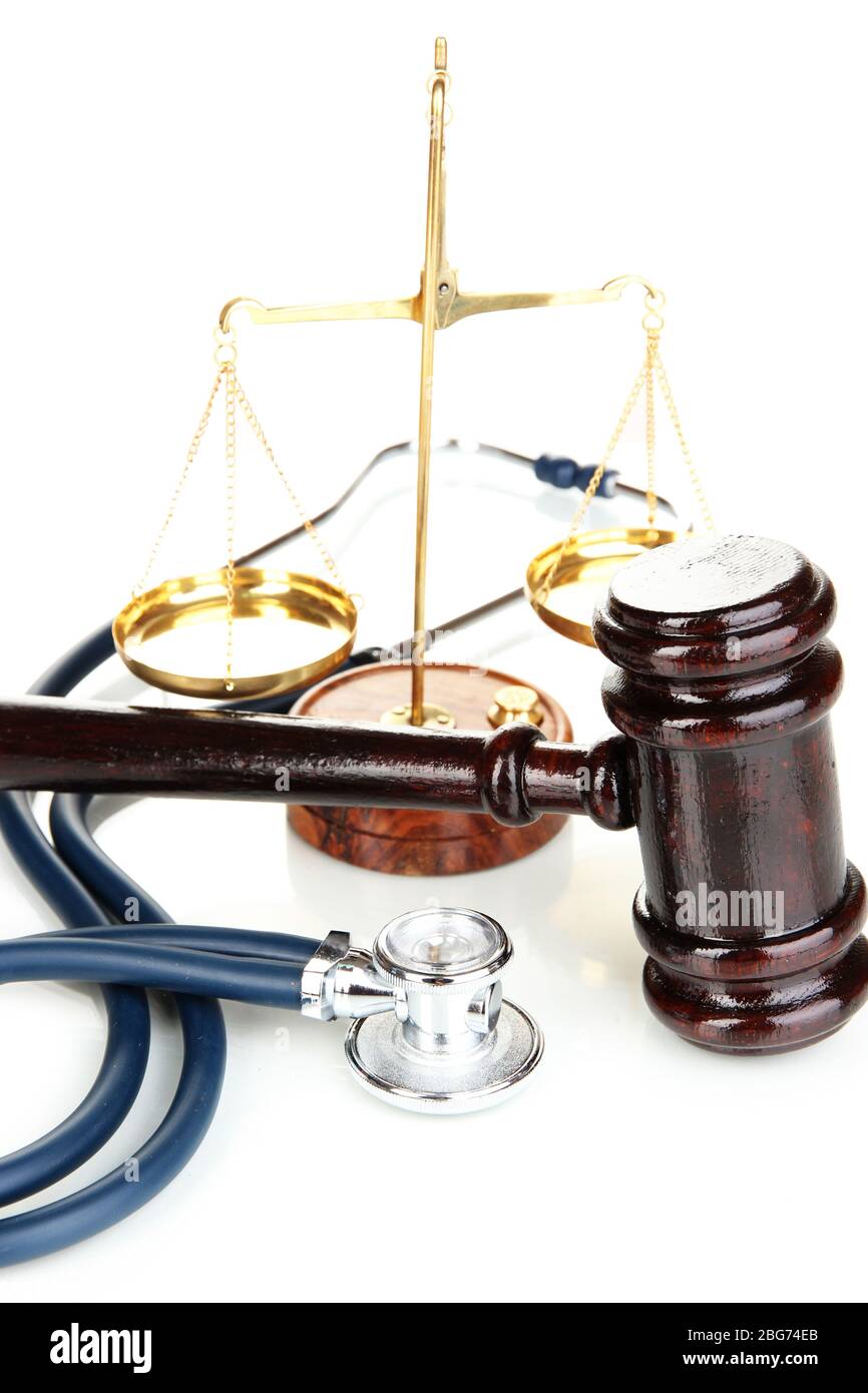 Medicine law concept. Gavel, scales and stethoscope isolated on white ...