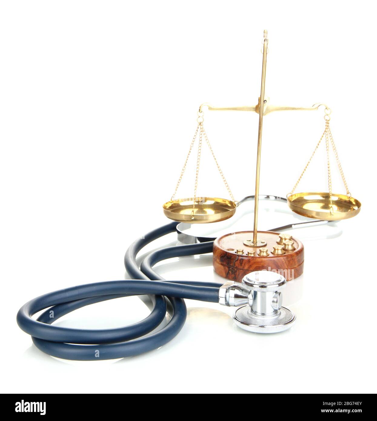 Medicine law concept. Gavel, scales and stethoscope isolated on white ...
