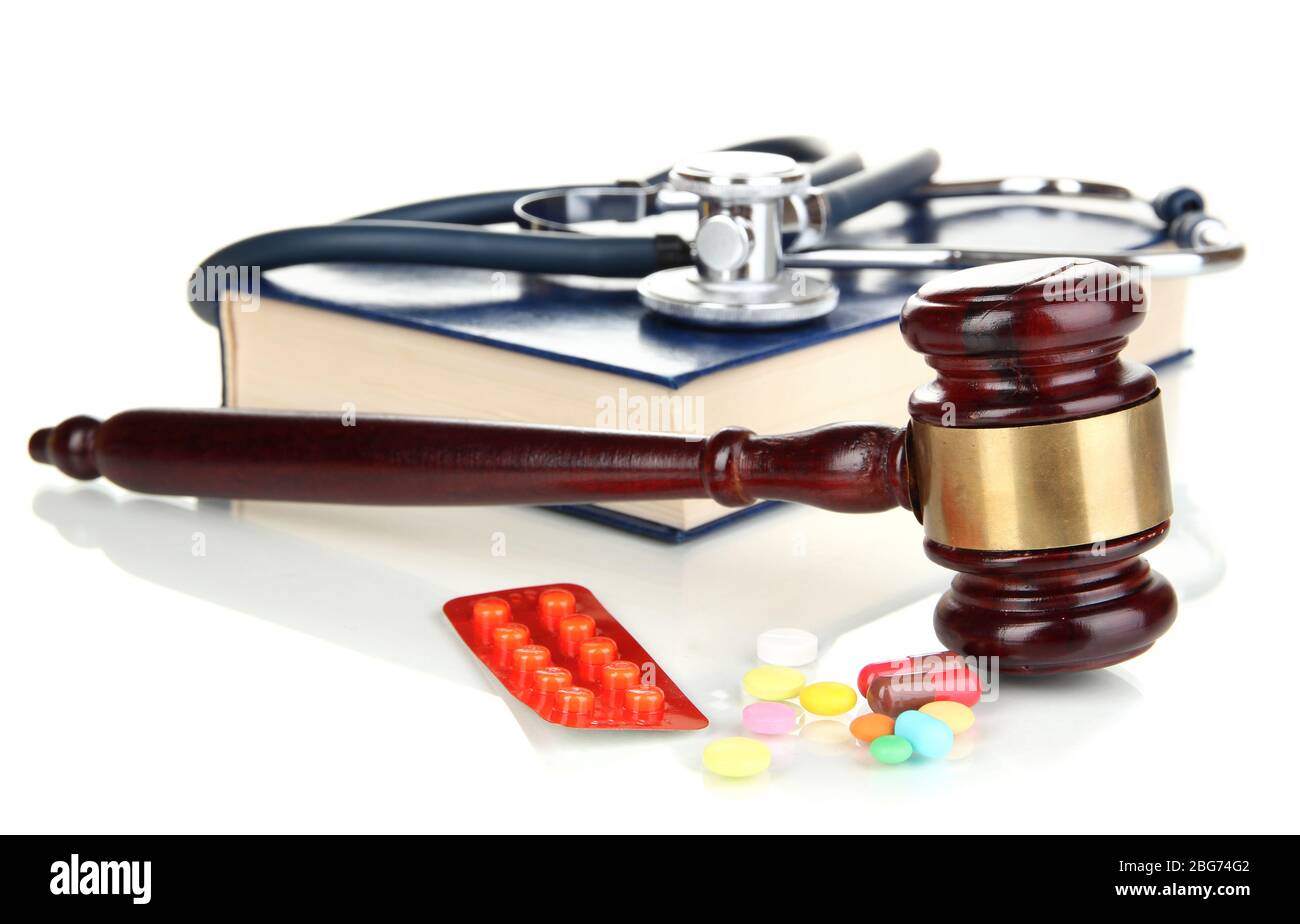 Medicine law concept. Gavel and pills isolated on white Stock Photo - Alamy