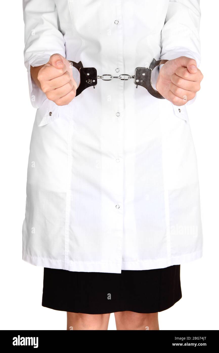 Doctor in handcuffs isolated on white Stock Photo - Alamy