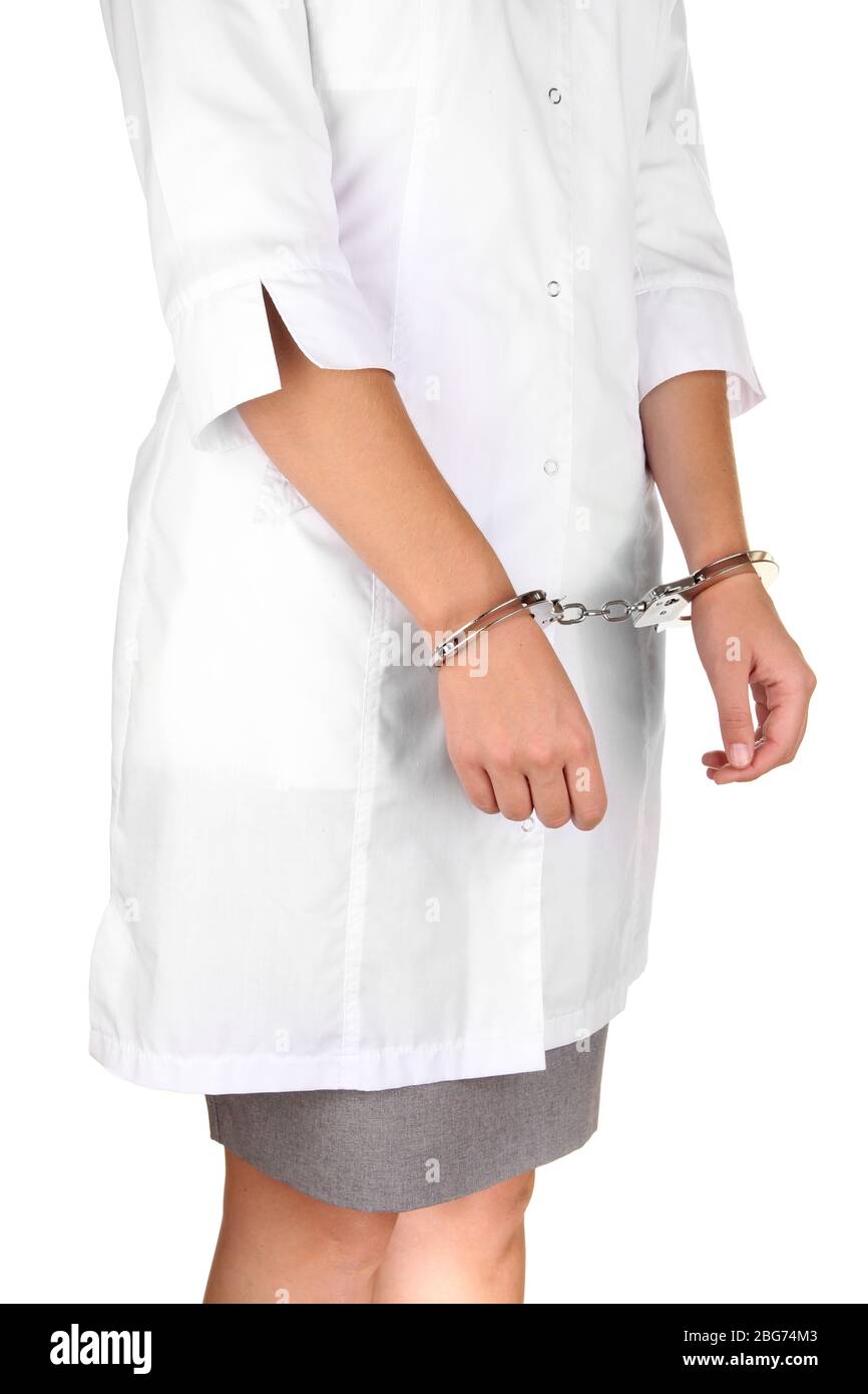 Doctor in handcuffs isolated on white Stock Photo - Alamy