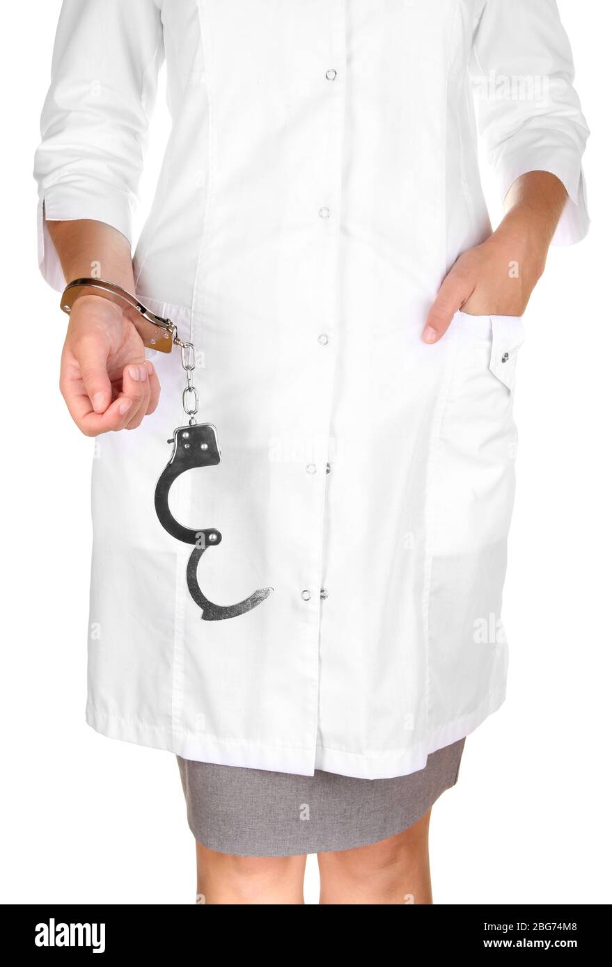 Doctor in handcuffs isolated on white Stock Photo - Alamy