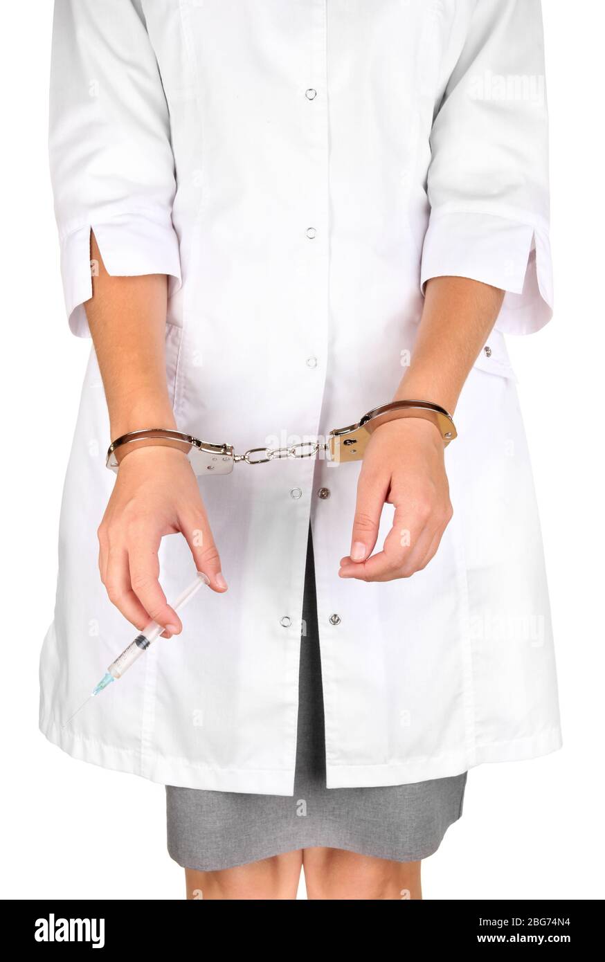 Doctor with syringe in handcuffs isolated on white Stock Photo - Alamy