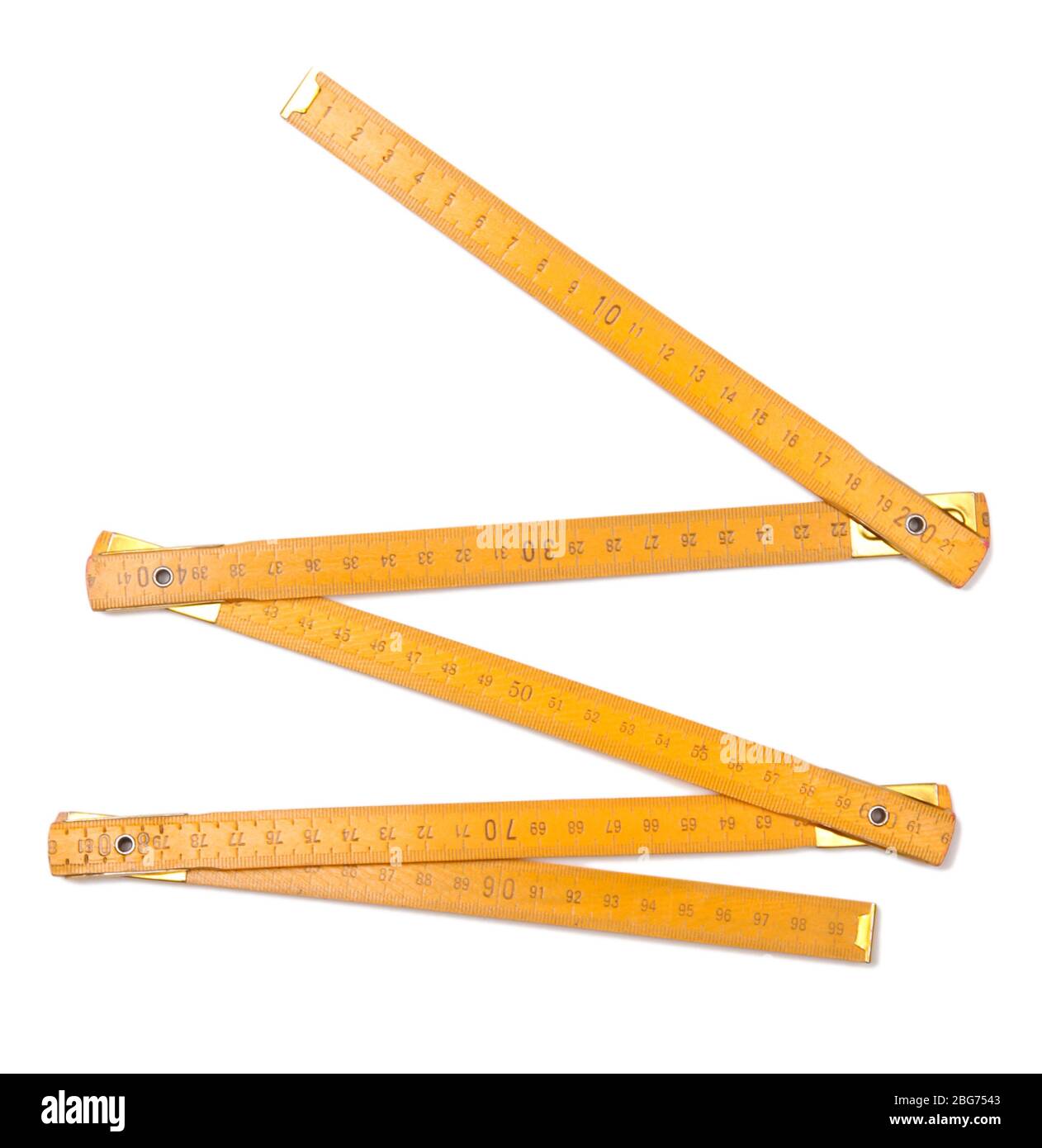 Folding ruler isolated on white Stock Photo - Alamy