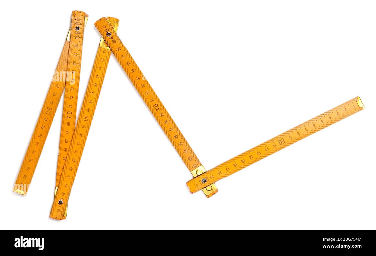 Folding ruler isolated on white Stock Photo - Alamy