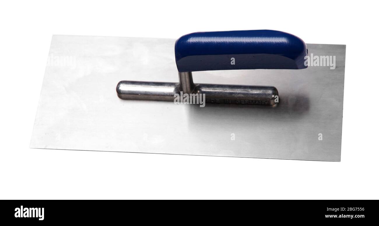 Metal building spatula isolated on a white Stock Photo - Alamy