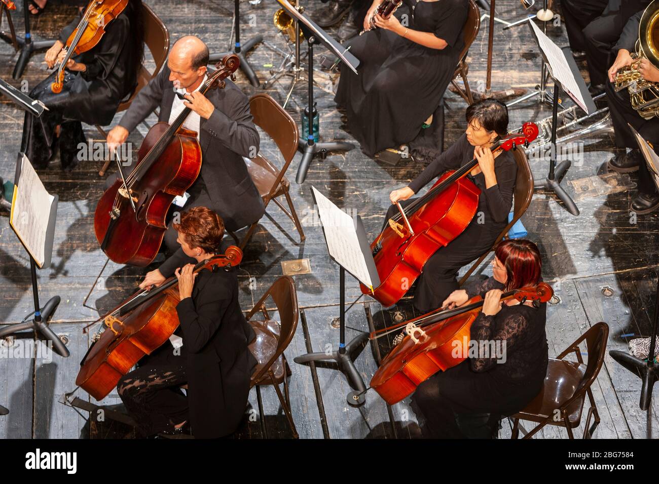 Cellos hi-res stock photography and images - Alamy