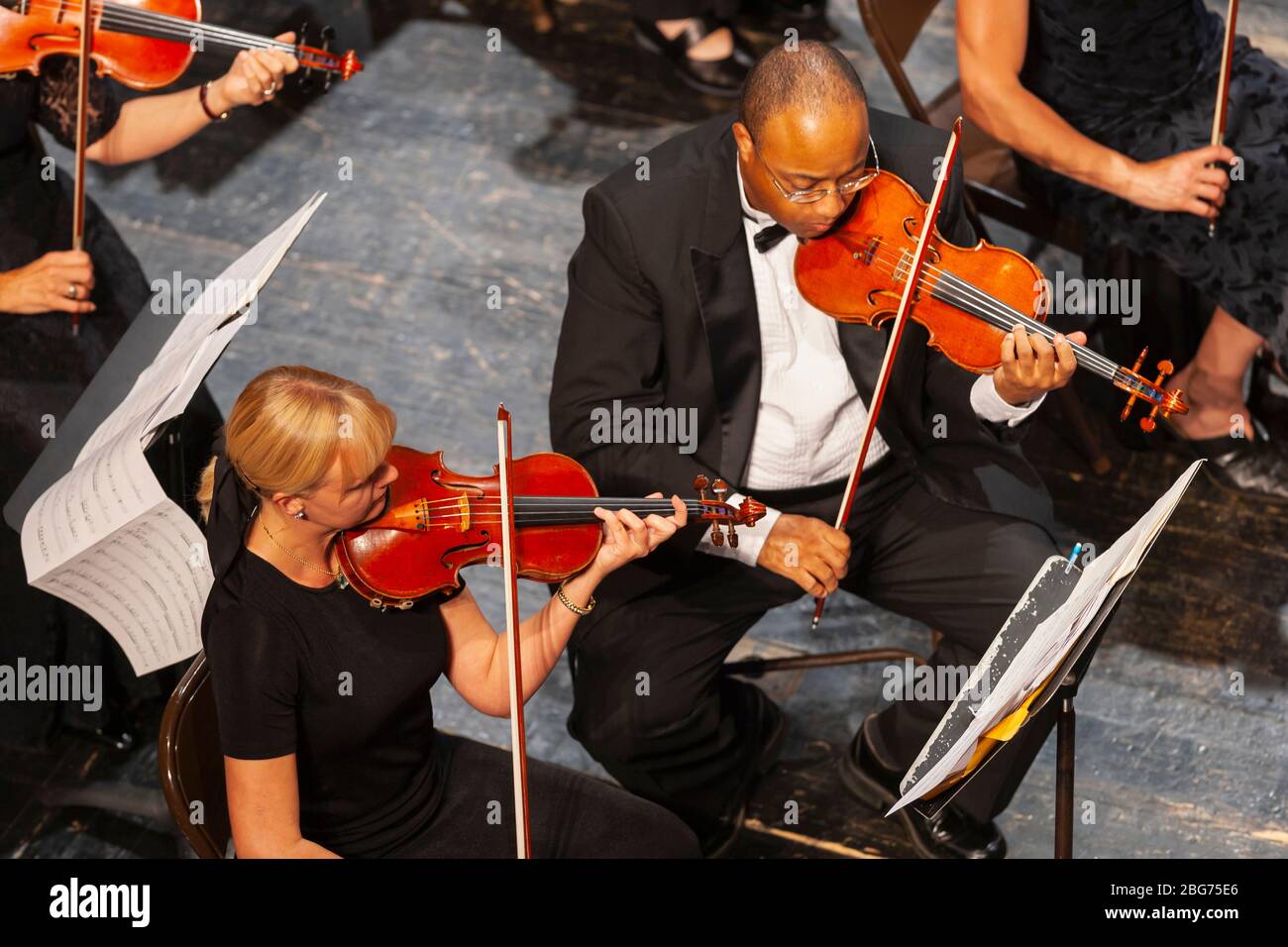 High angle view of violins performing (model released) in classical ...