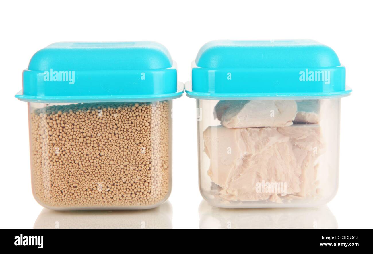 Dry yeast in containers isolated on white Stock Photo - Alamy