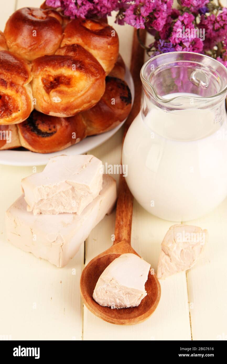 Dry yeast with pastry on wooden table close-up Stock Photo - Alamy