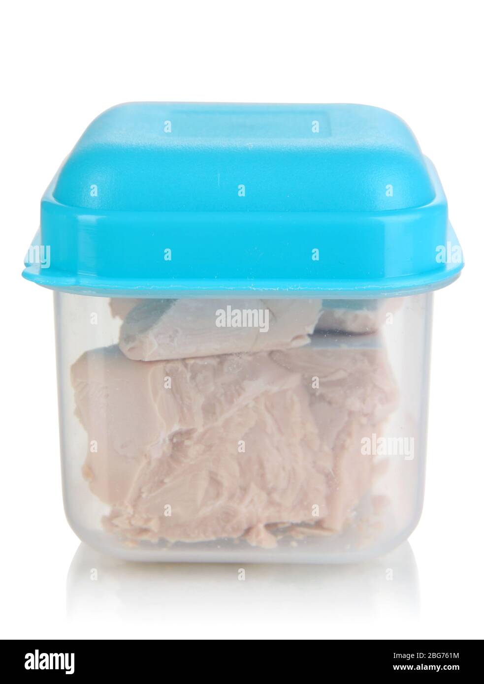 Dry yeast in container isolated on white Stock Photo - Alamy