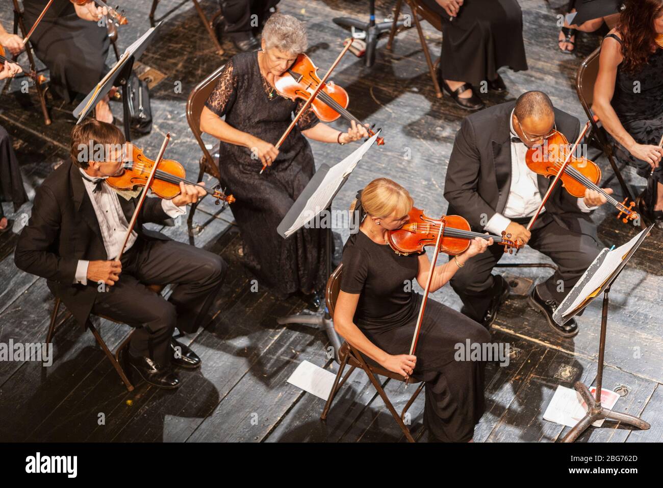 High angle view of violins performing (model released) in classical ...