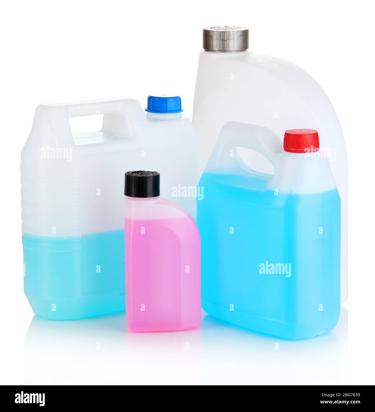 Different liquids for car in canisters isolated on white Stock Photo ...